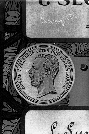 Utställningsmedalj, med följande text: "Gustaf V Sveriges Götes och ...